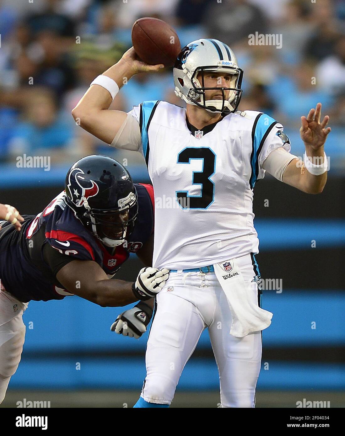 Carolina Panthers quarterback Derek Anderson passes under pressure ...