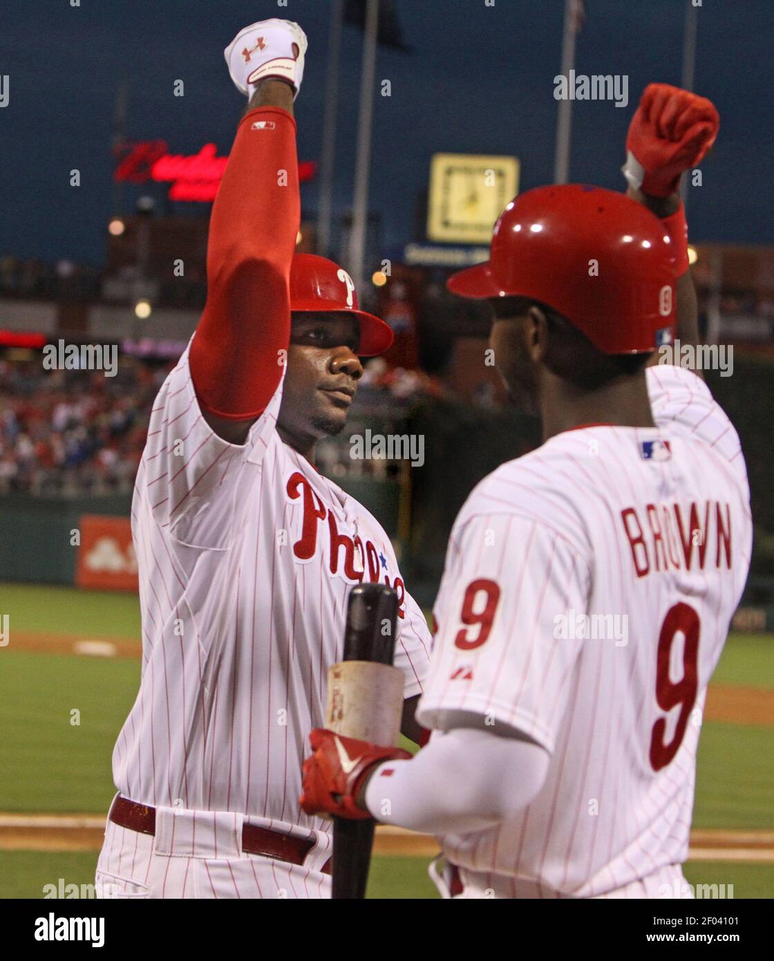 Philadelphia Phillies' Domonic Brown, right, congratulates Ryan Howard ...