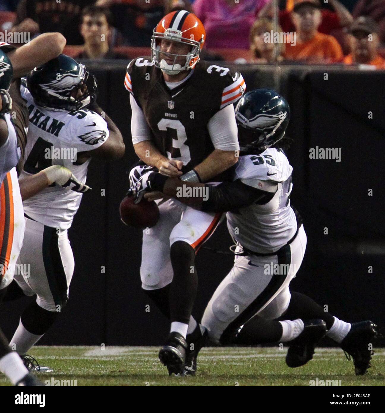 Cleveland Browns quarterback Brandon Weeden (3) gets sacked and ...