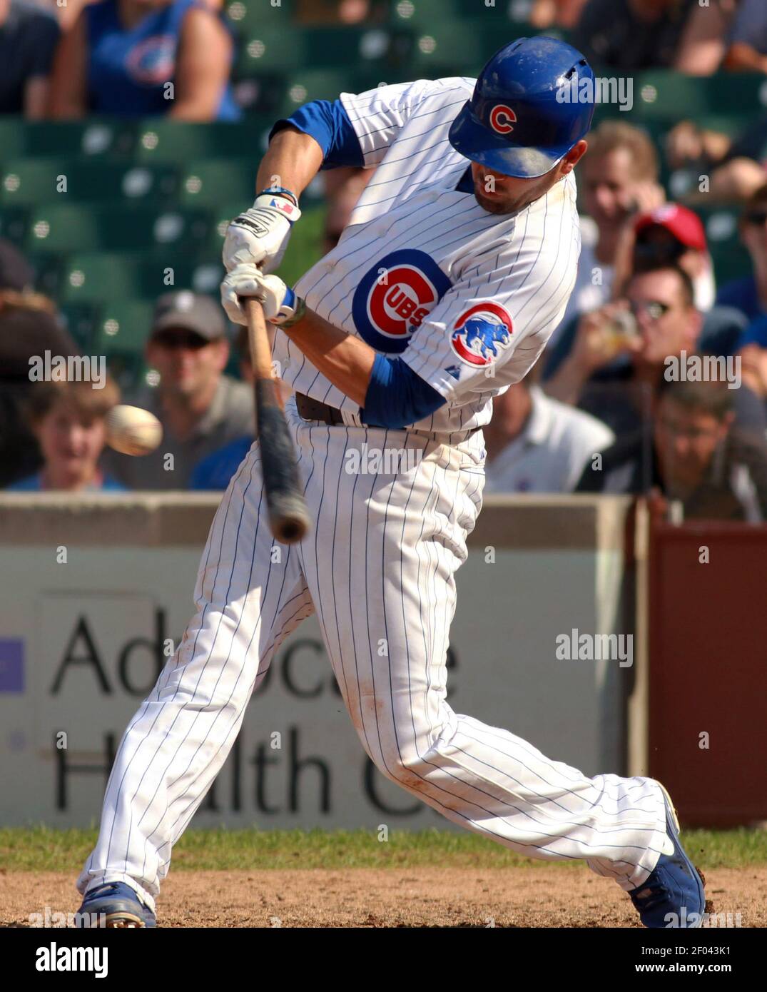 Chicago Cubs' David DeJesus hits a single in the 8th inning against the ...