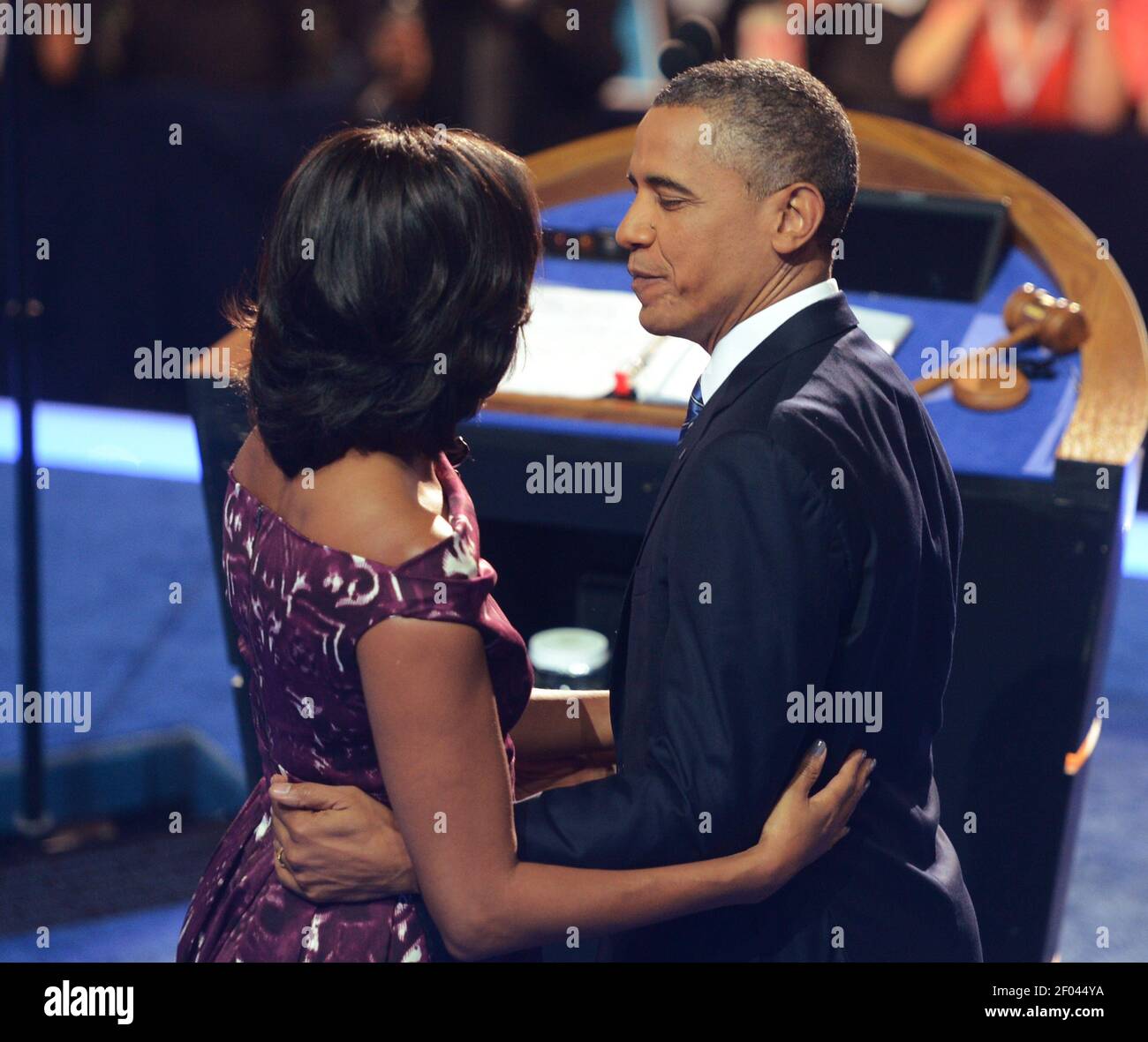 President Barack Obama hugs his wife, Michelle, on stage at the 2012 ...