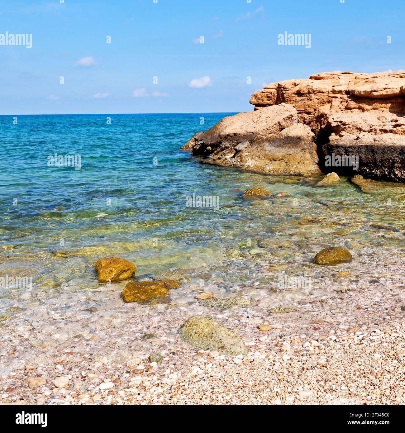 In oman coastline sea ocean gulf rock and beach relax near sky Stock ...