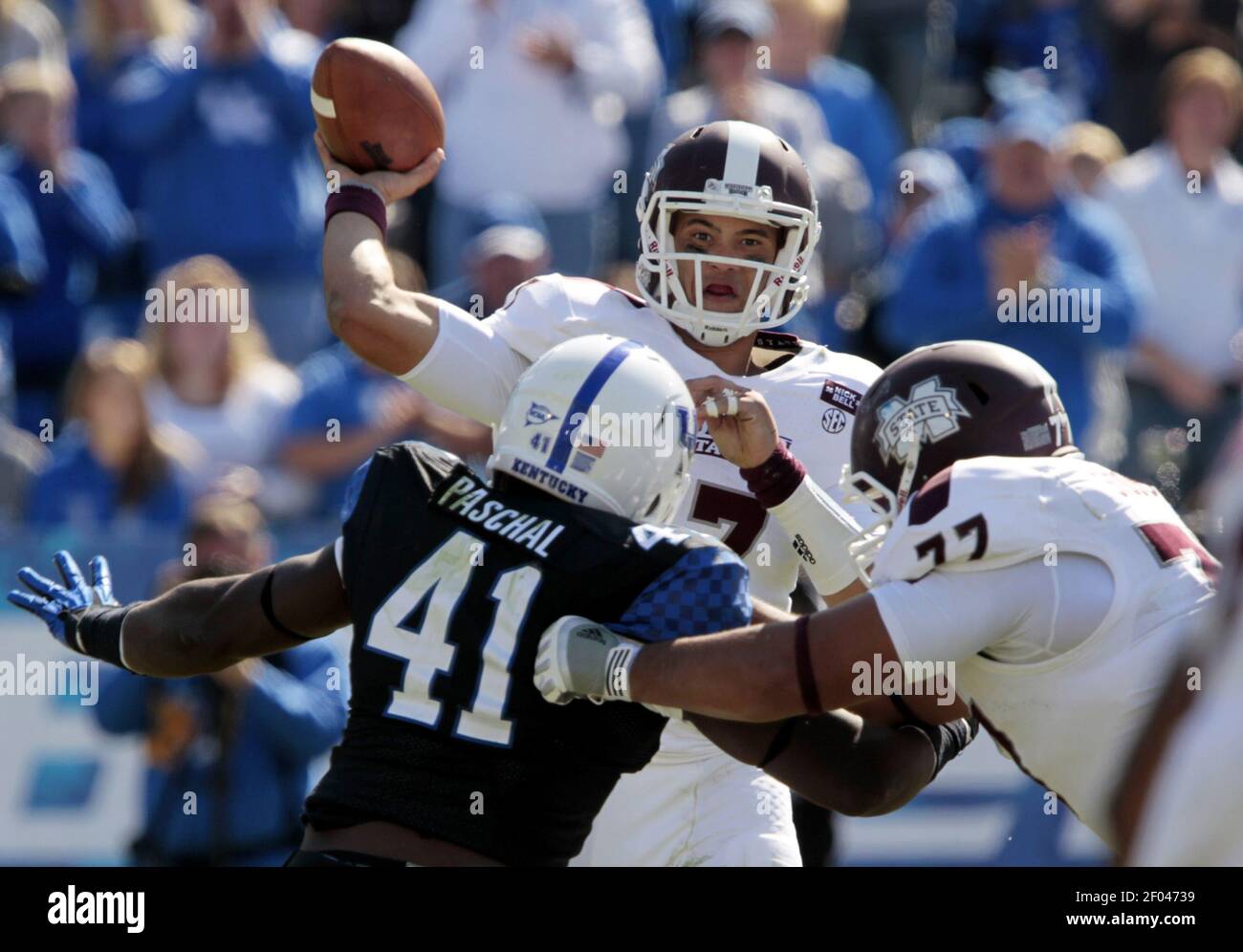 Mississippi State quarterback Tyler Russell passes, as teammate Charles ...