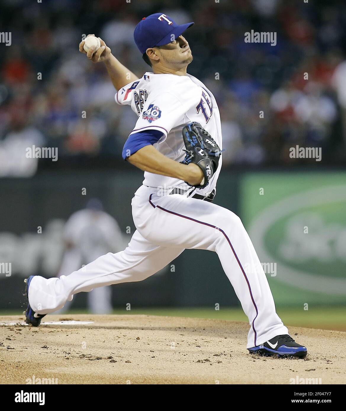 Texas Rangers starter Martin Perez (33) throws a pitch during the first ...