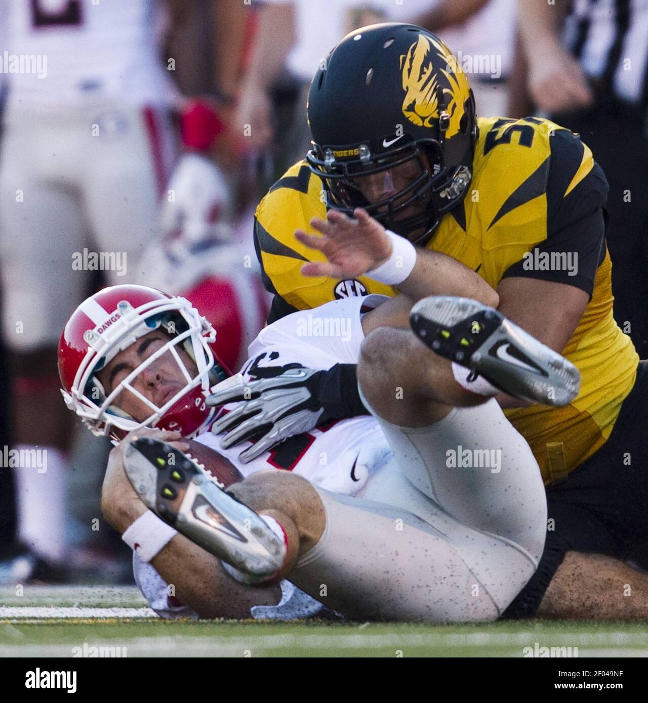 Missouri defensive lineman Brad Madison (57) sacks Georgia quarterback ...