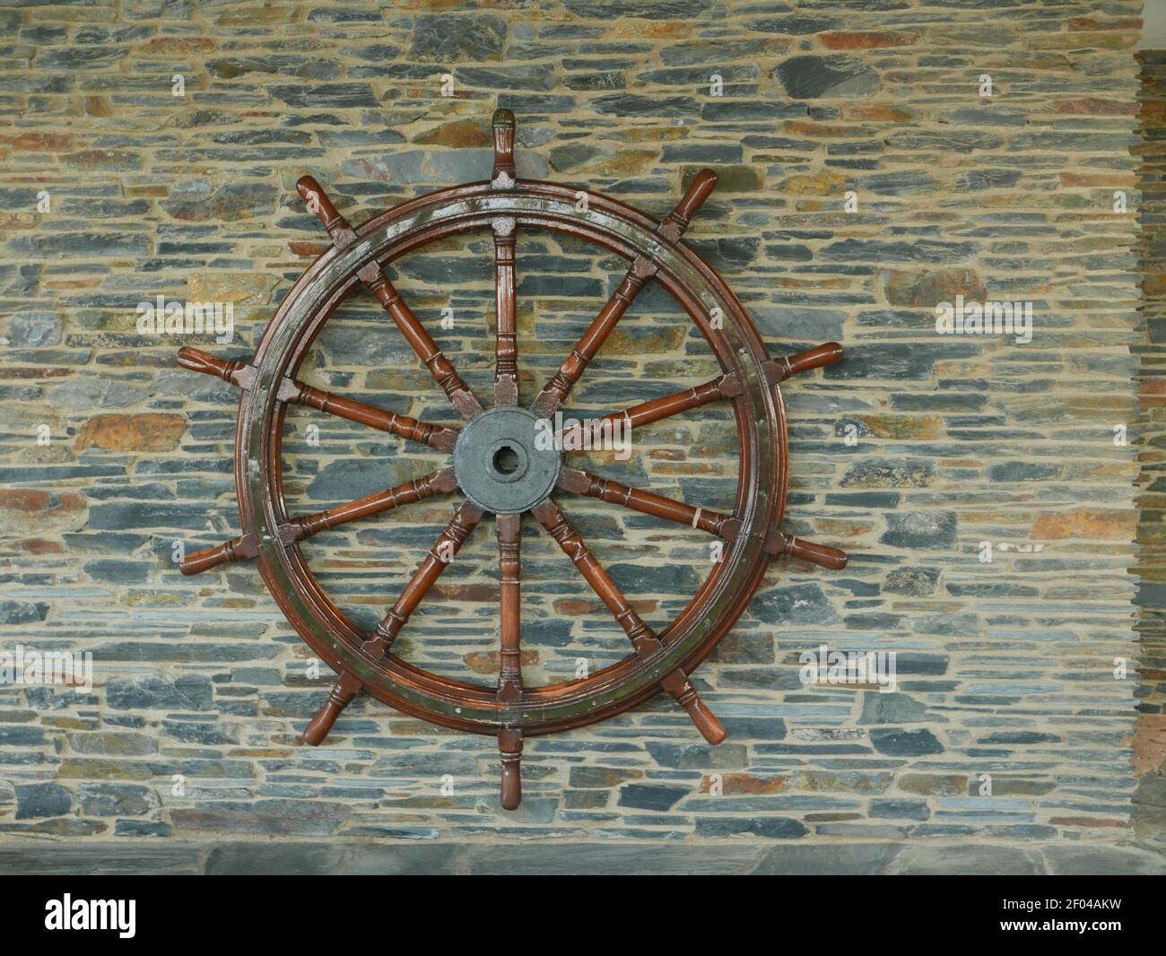 A closeup shot of a wheel on a wall perfect for using as a background ...