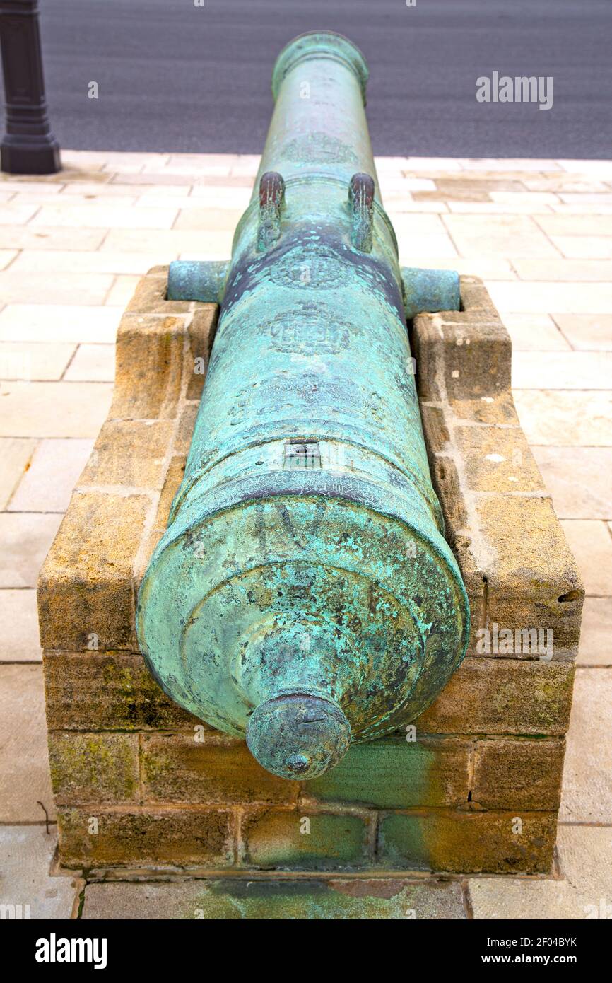 Bronze cannon in africa morocco green and the old pavement Stock Photo ...