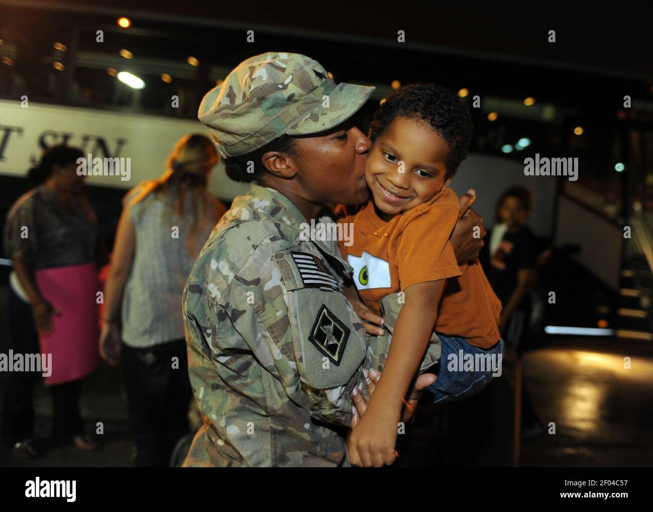 Eureka Linder, left, hugs Gabriel Toussaint, of Pembroke Pines, as she ...