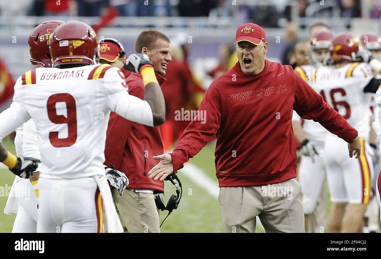 Iowa State head coach Paul Rhoads congratulates his players after ...
