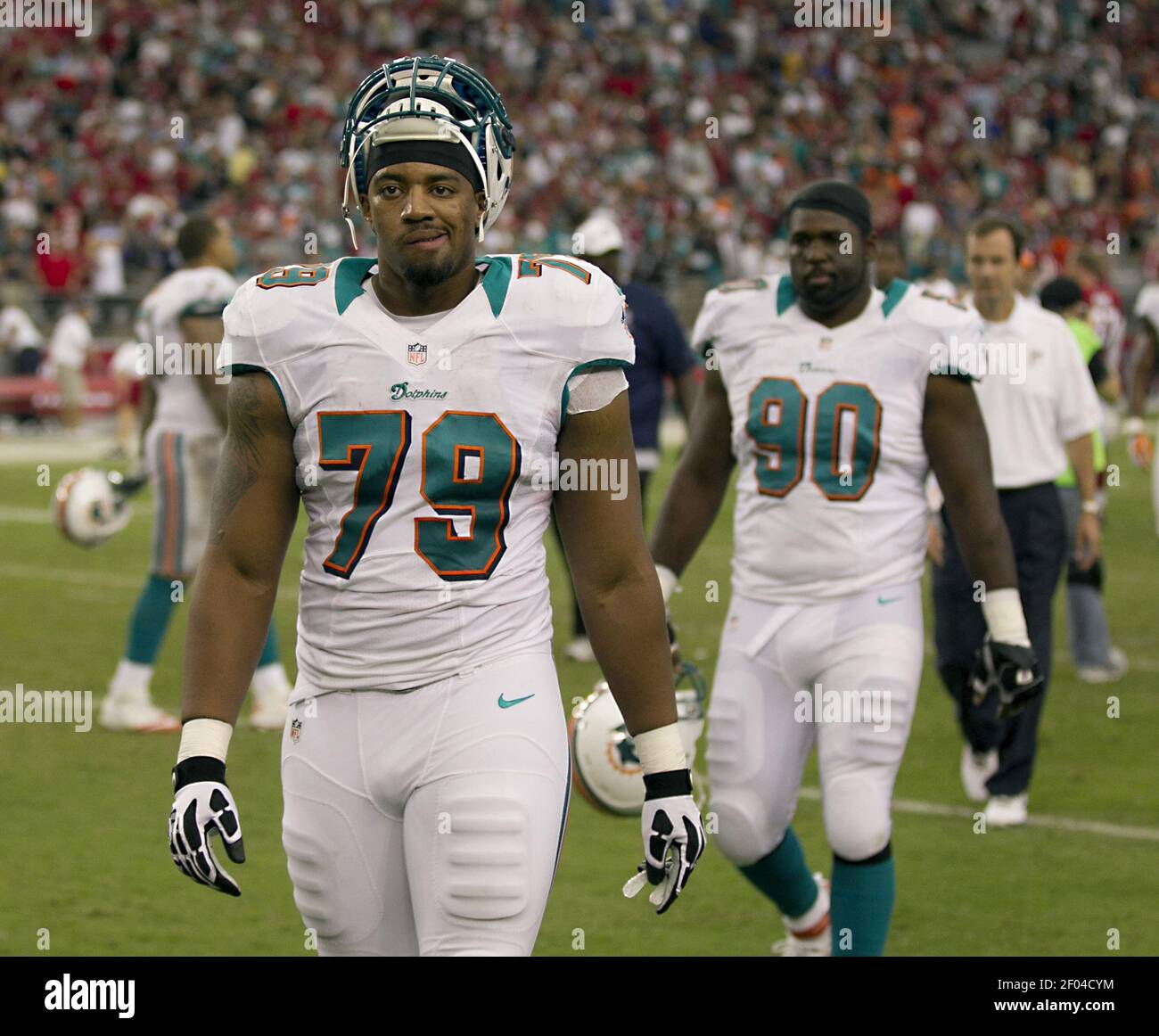 Miami dolphins defensive end Derrick Shelby and Andre Fluellen leave ...