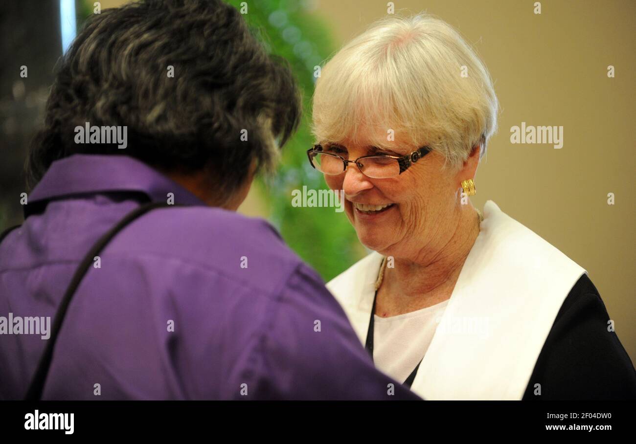 Diane Dougherty, right, speaks with Angelia Vazquez after worship ...