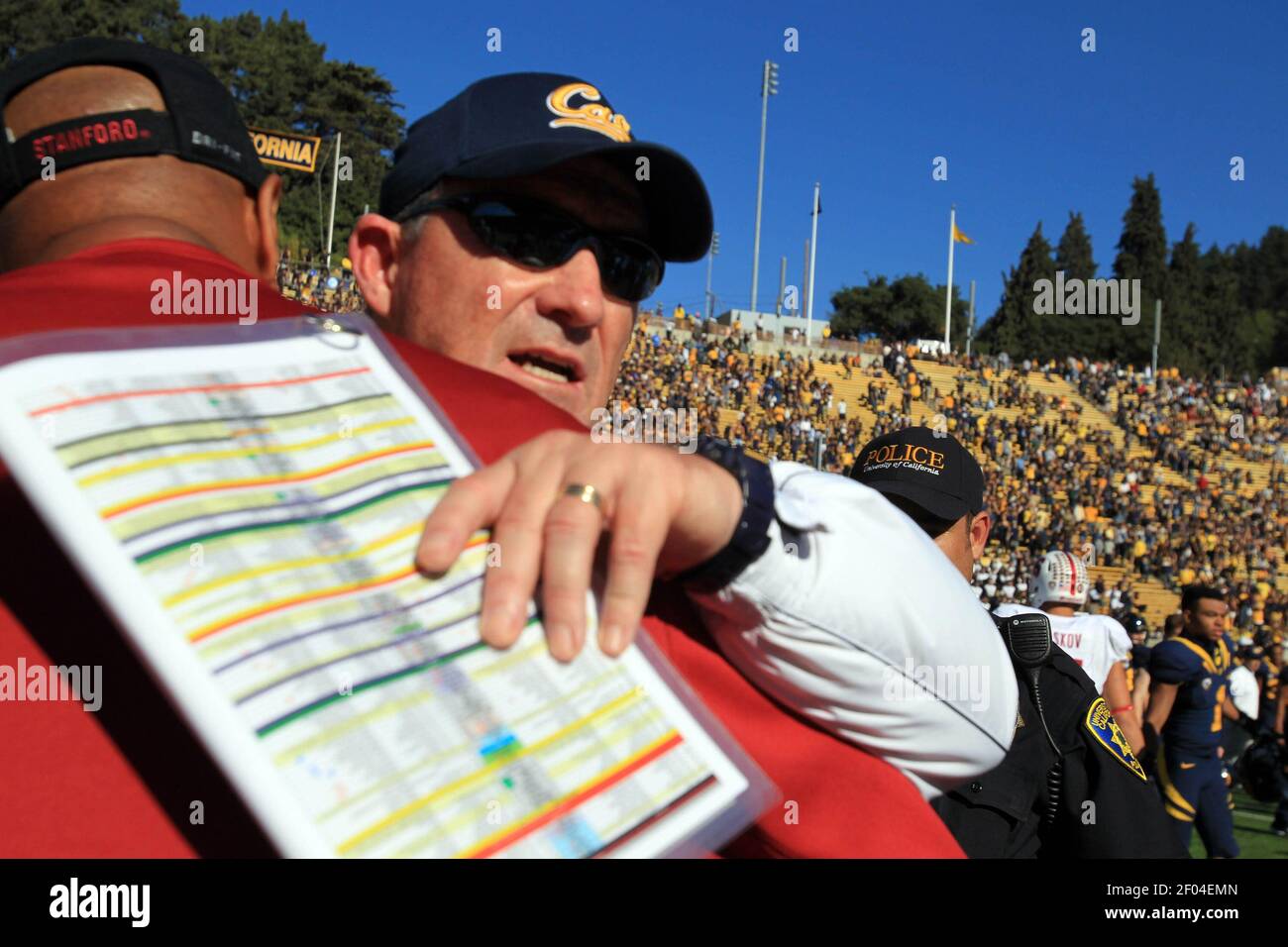 Stanford head coach David Shaw, left, is congratulated by Cal head ...