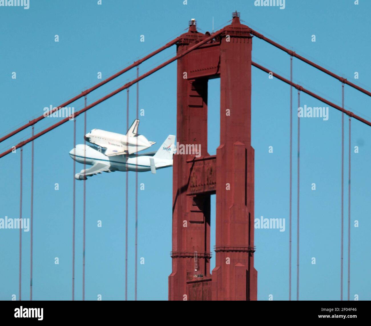 The space shuttle Endeavour flies over the Golden Gate Bridge in San ...