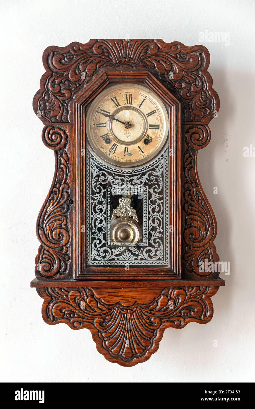 Antique wall clock, Holguin, Cuba Stock Photo - Alamy