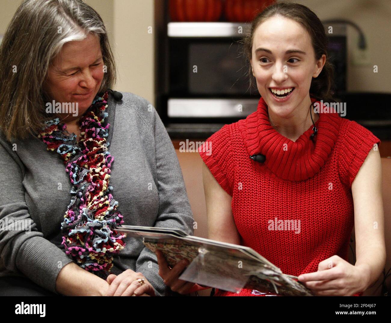 Kate McCasland, right, and her mother Jane McCasland, left, look over ...