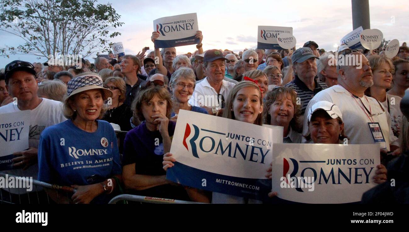 Supporters cheer for Republican presidential candidate Mitt Romney at a ...