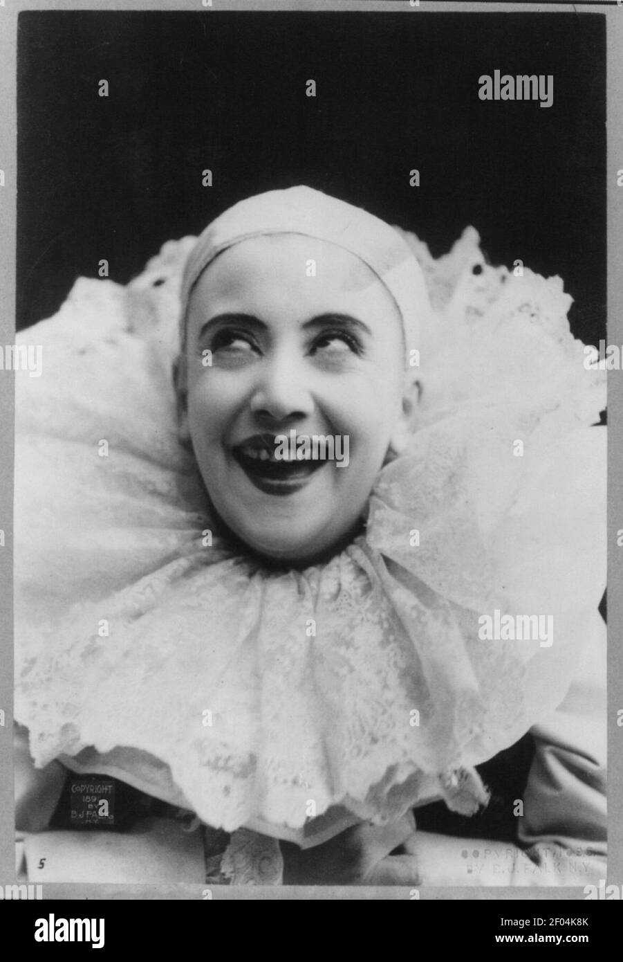 Pilar Morin as clown-mime- head and shoulders, facing slightly left ...