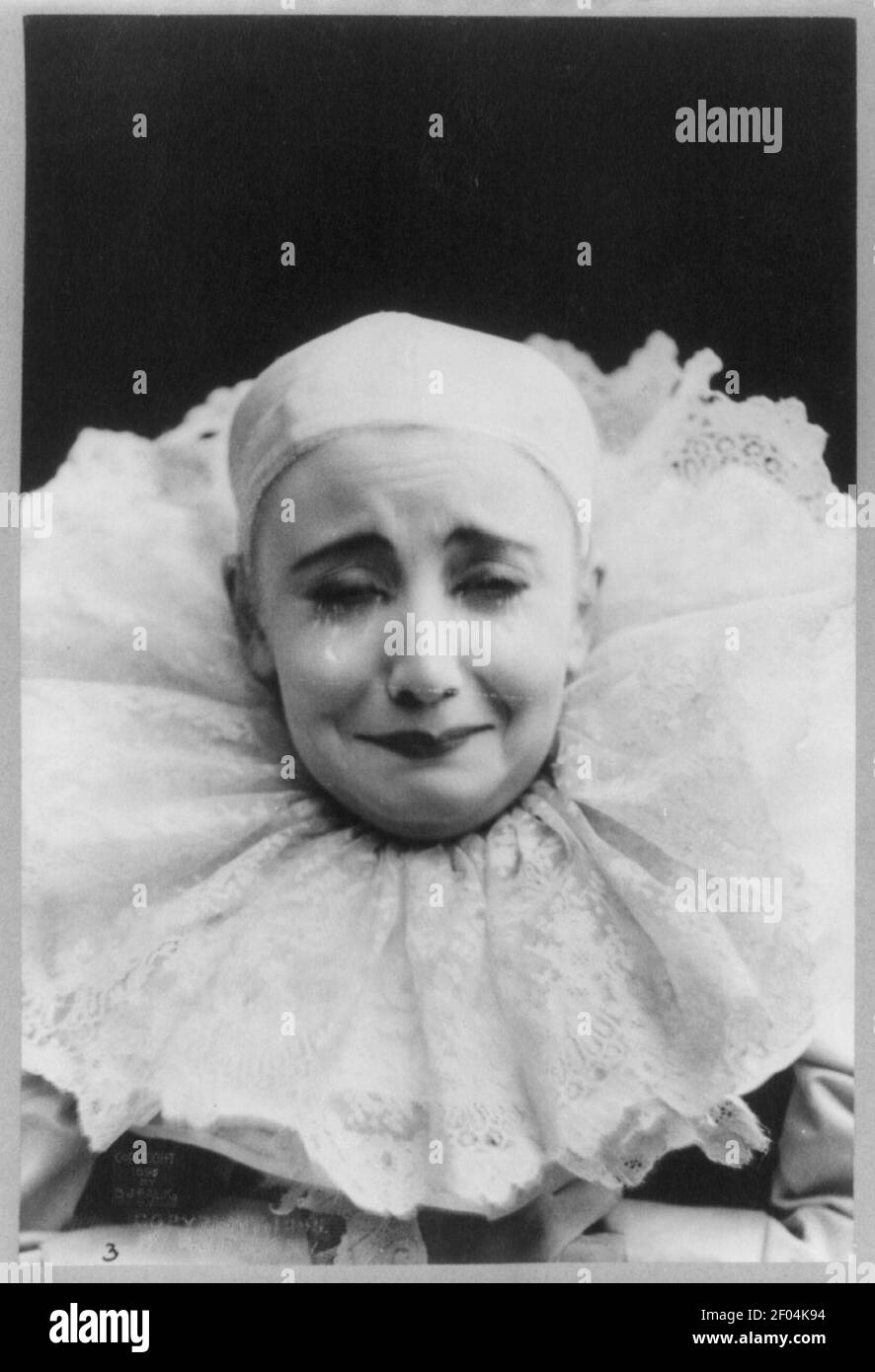 Pilar Morin as clown-mime- head and shoulders, facing front; crying ...