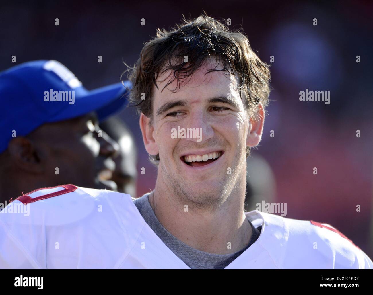 New York Giants quarterback Eli Manning (10) smiles on the sidelines ...