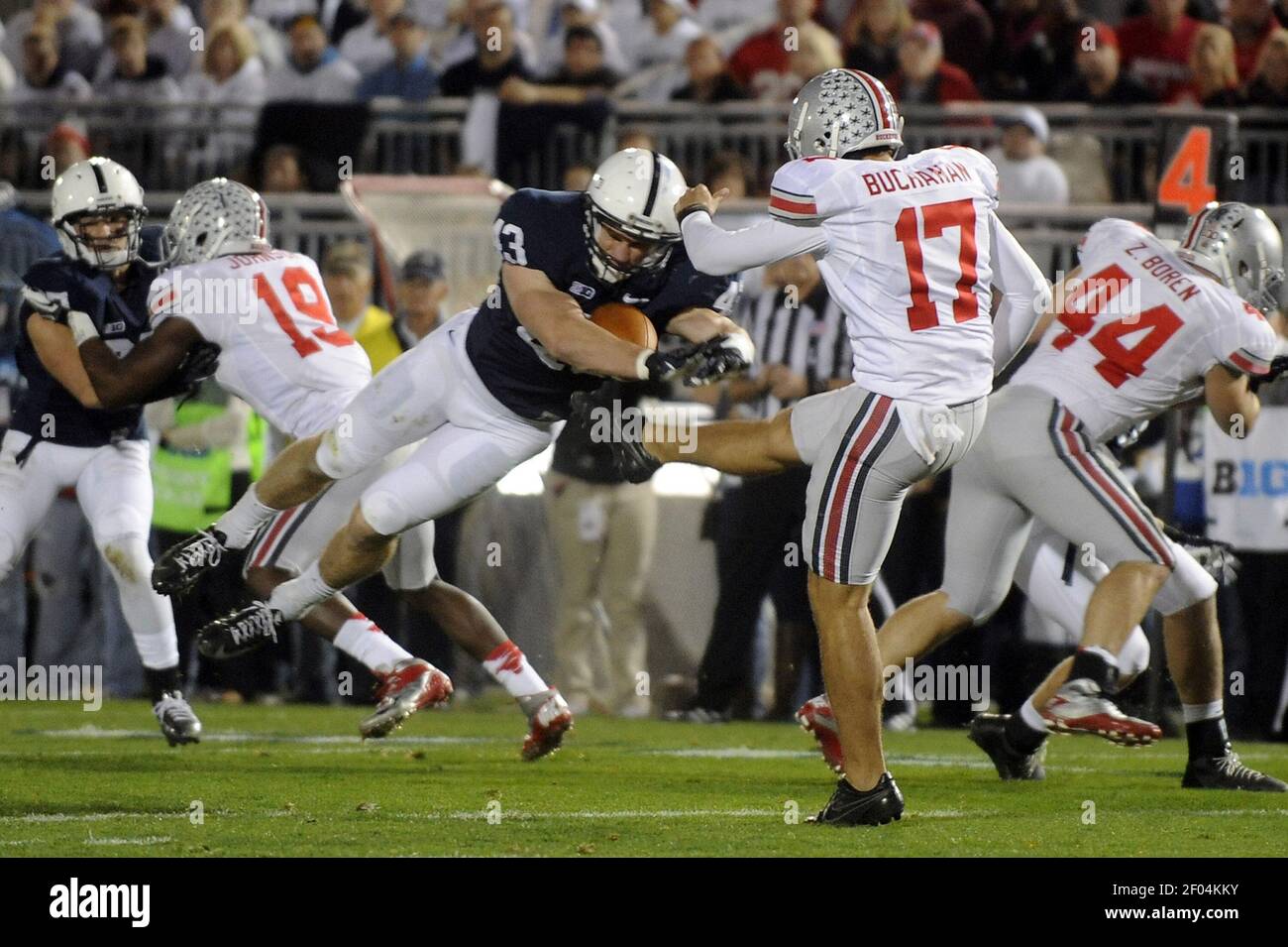 Penn State's Mike Hull (43) blocks a punt by Ohio State punter Ben ...
