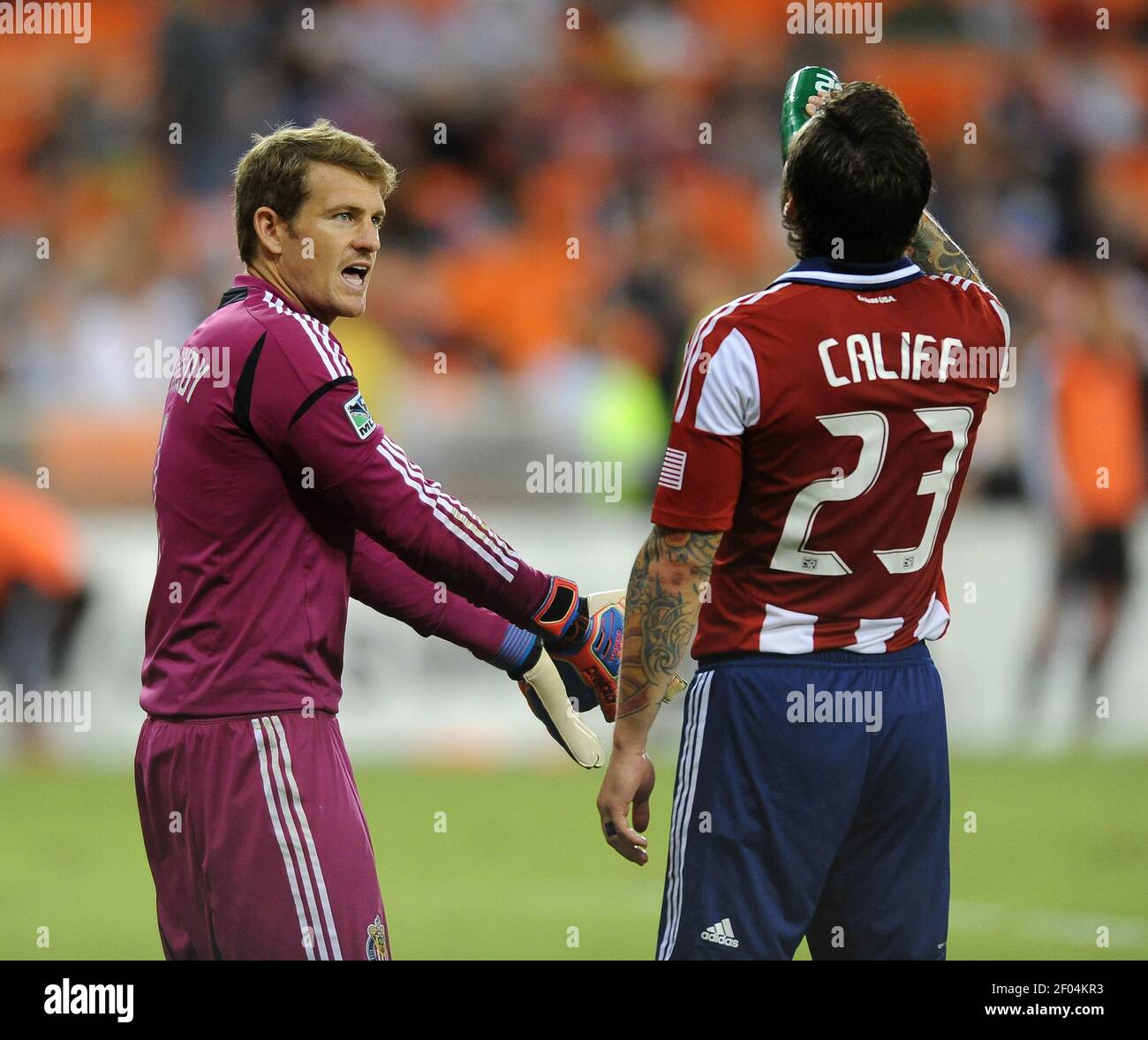 Chivas USA goalkeeper Dan Kennedy (1), left, has a word with teammate ...