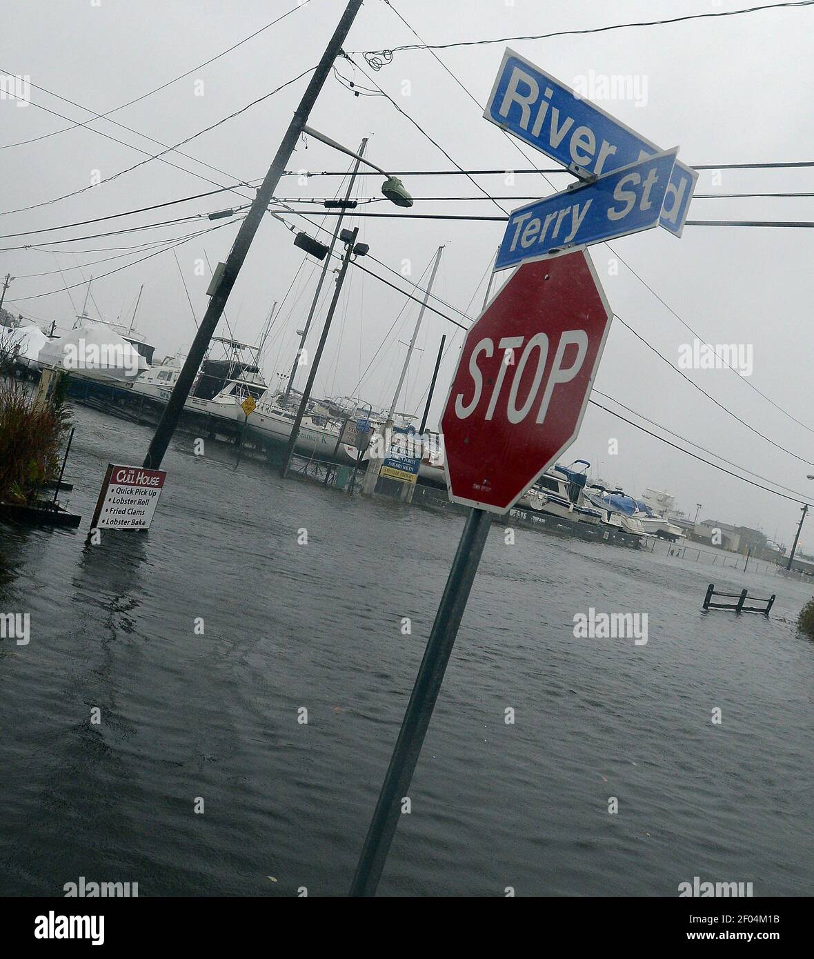 Roads are flooded in Sayville, on Long Island's South Shore, Monday ...