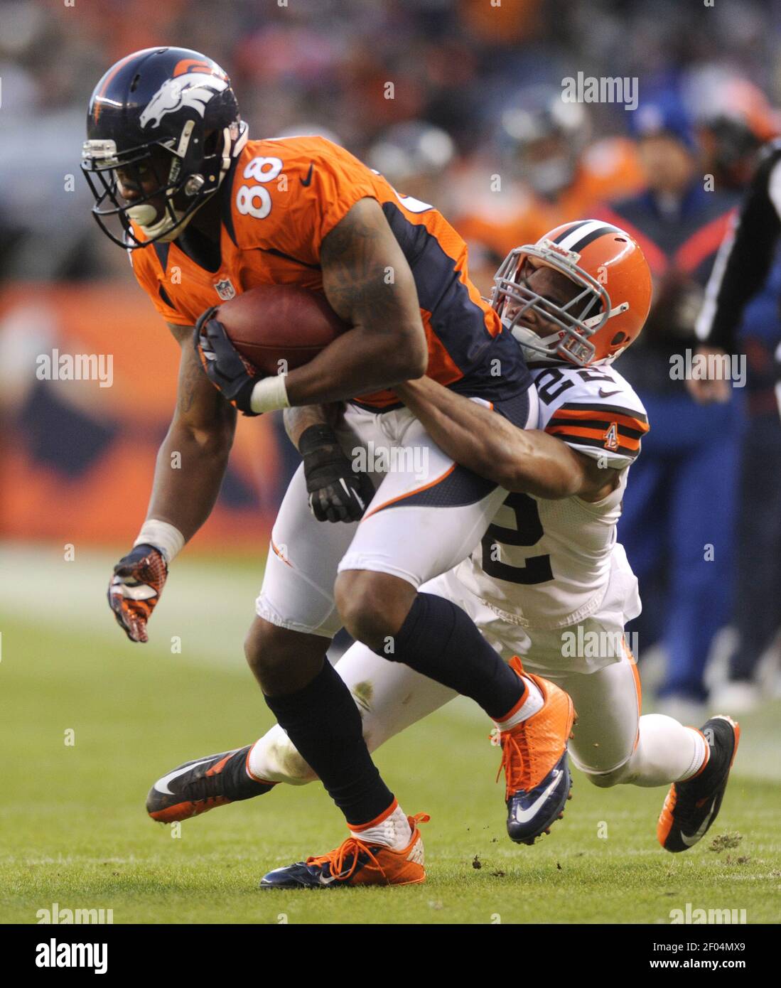 Denver Broncos wide receiver Demaryius Thomas fights for extra yards as ...
