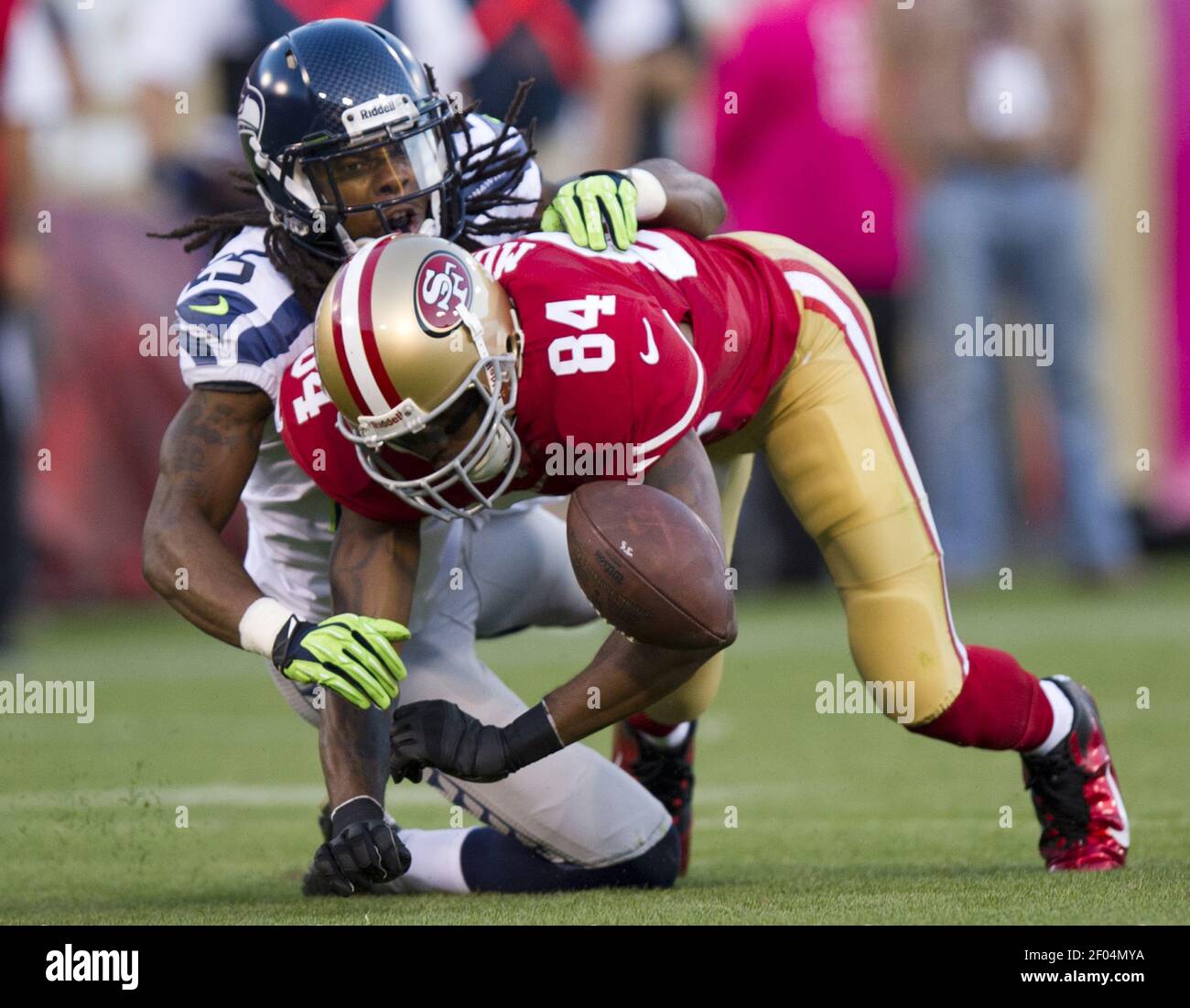 Seattle Seahawks cornerback Richard Sherman (25) breaks up a pass to ...