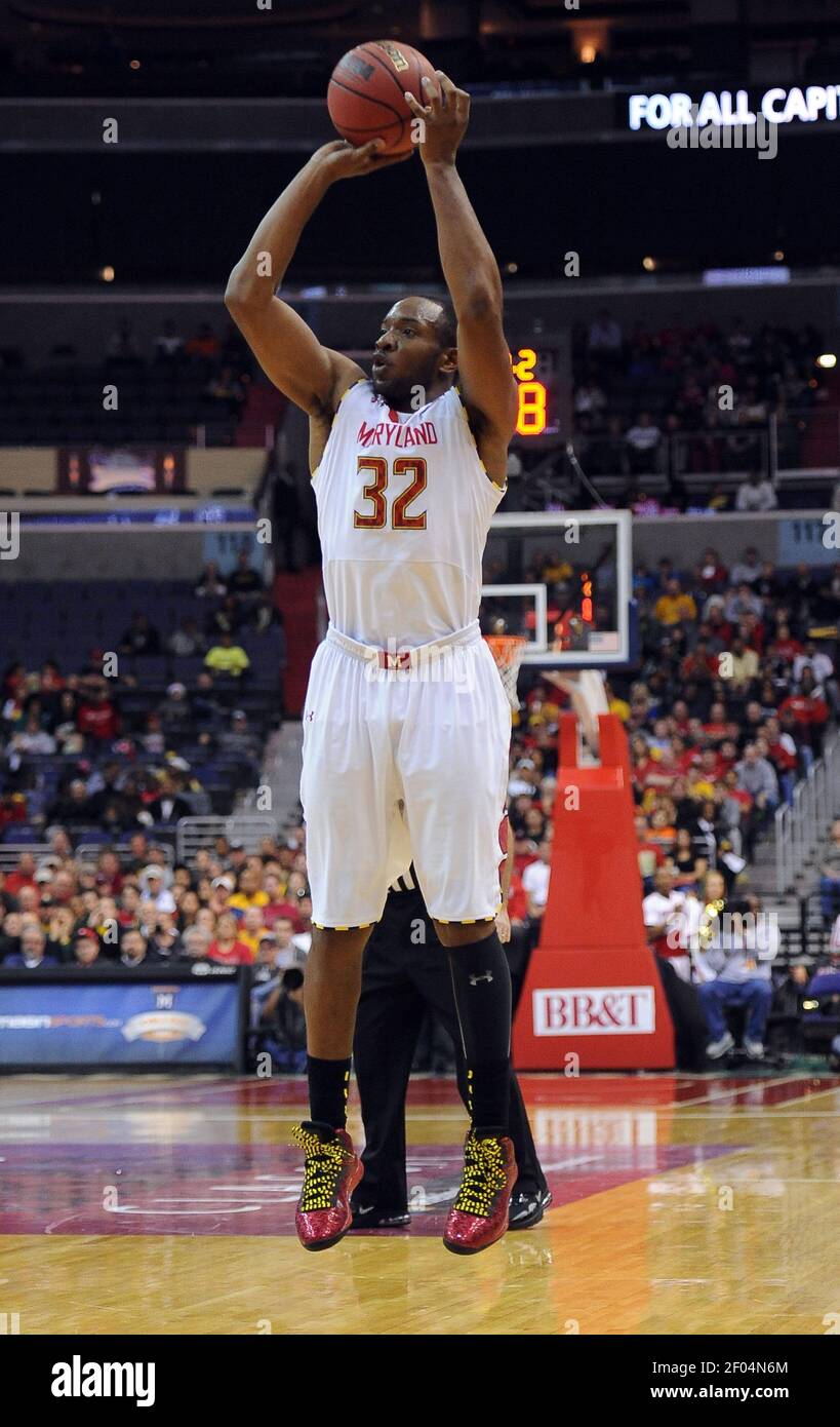 Maryland guard Dezmine Wells (32) hits a 3-point shot against George ...