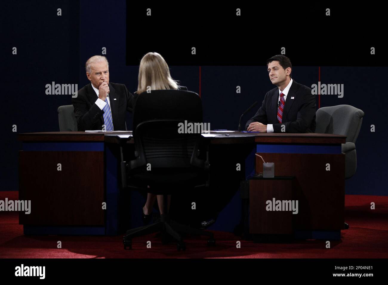 Vice President Joe Biden, left, and Congressman Paul Ryan listen to ...