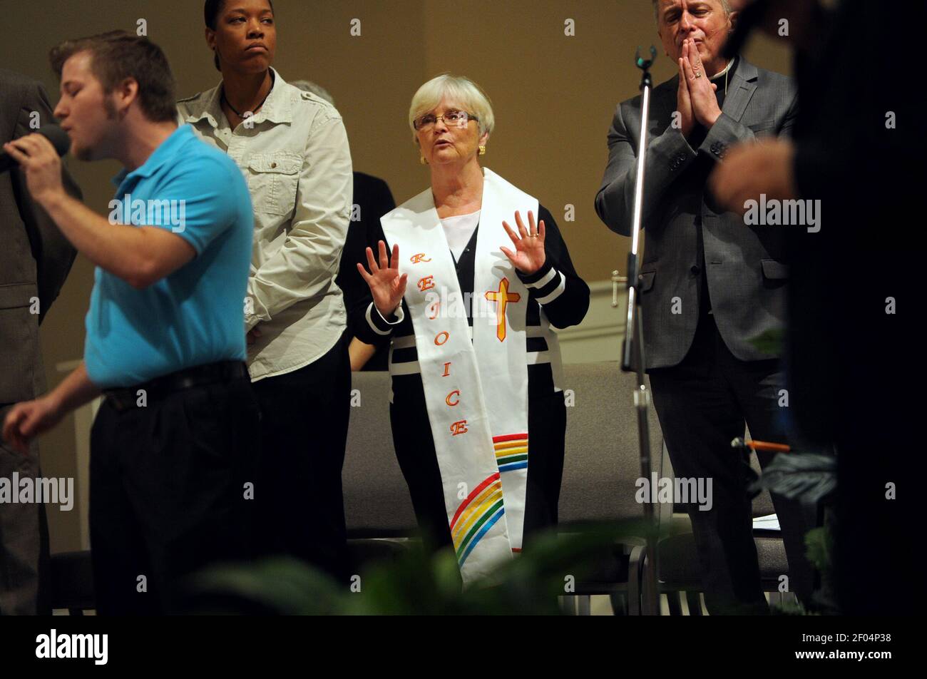 Diane Dougherty, center, worships at the First Metropolitan Community ...