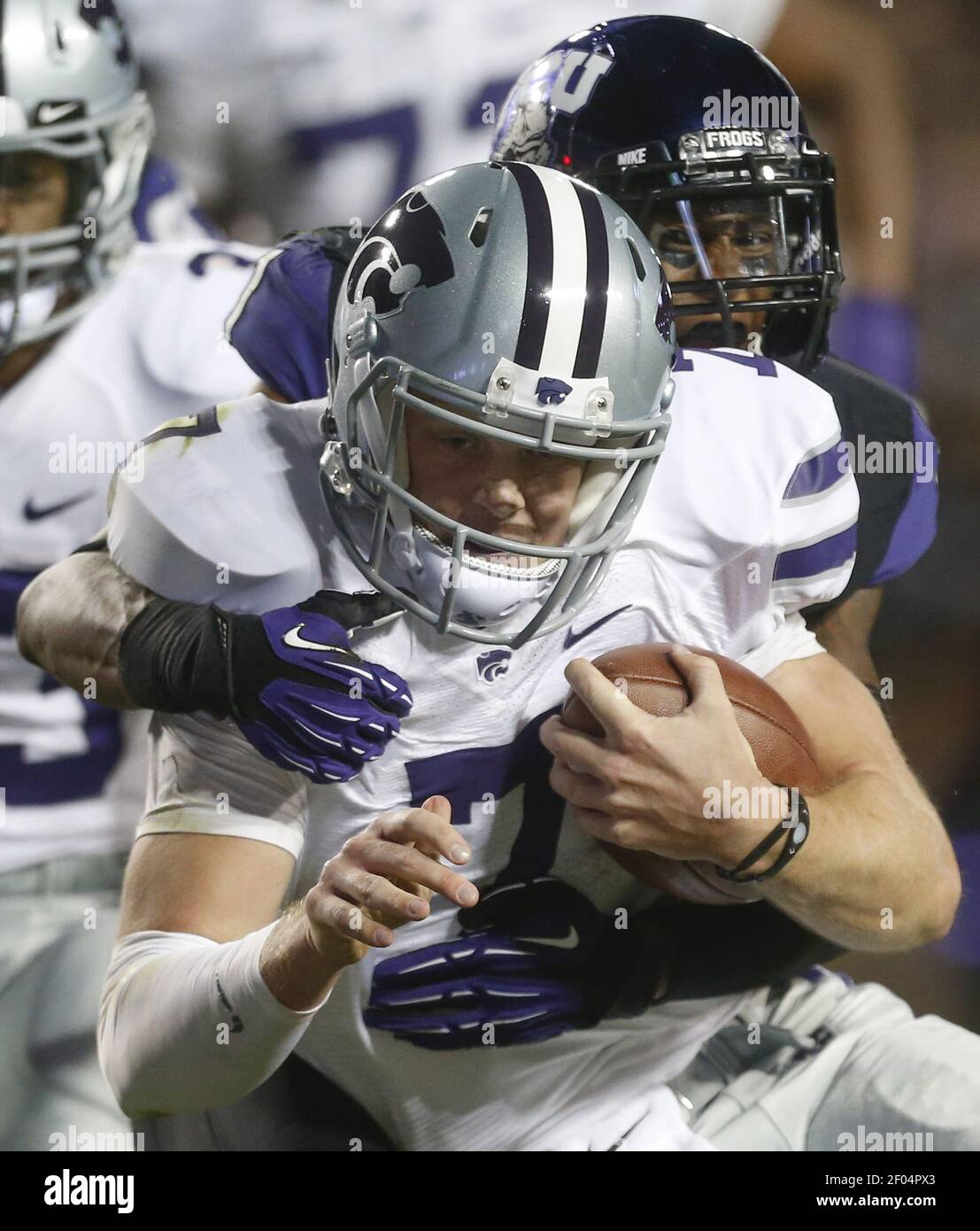 Kansas State quarterback Collin Klein (7) scores on a 7-yard touchdown ...