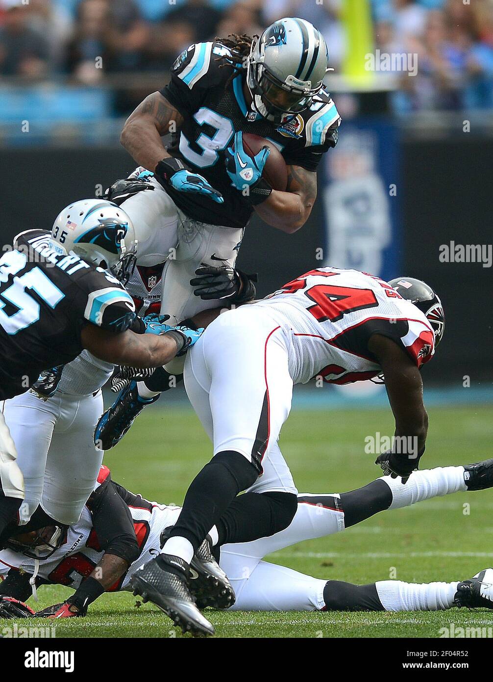 Carolina Panthers running back DeAngelo Williams rushes for yardage ...
