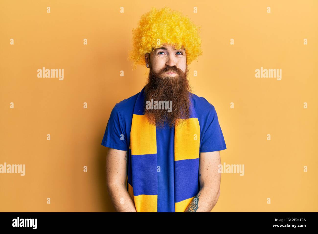 Redhead man with long beard football hooligan cheering game wearing ...