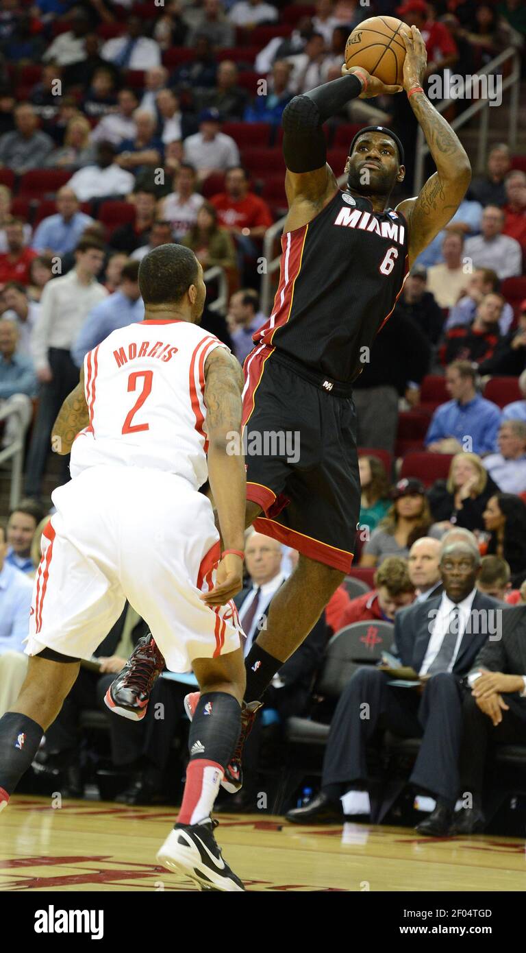 LeBron James (6) of the Miami Heat shoots over Marcus Morris (2) of the ...