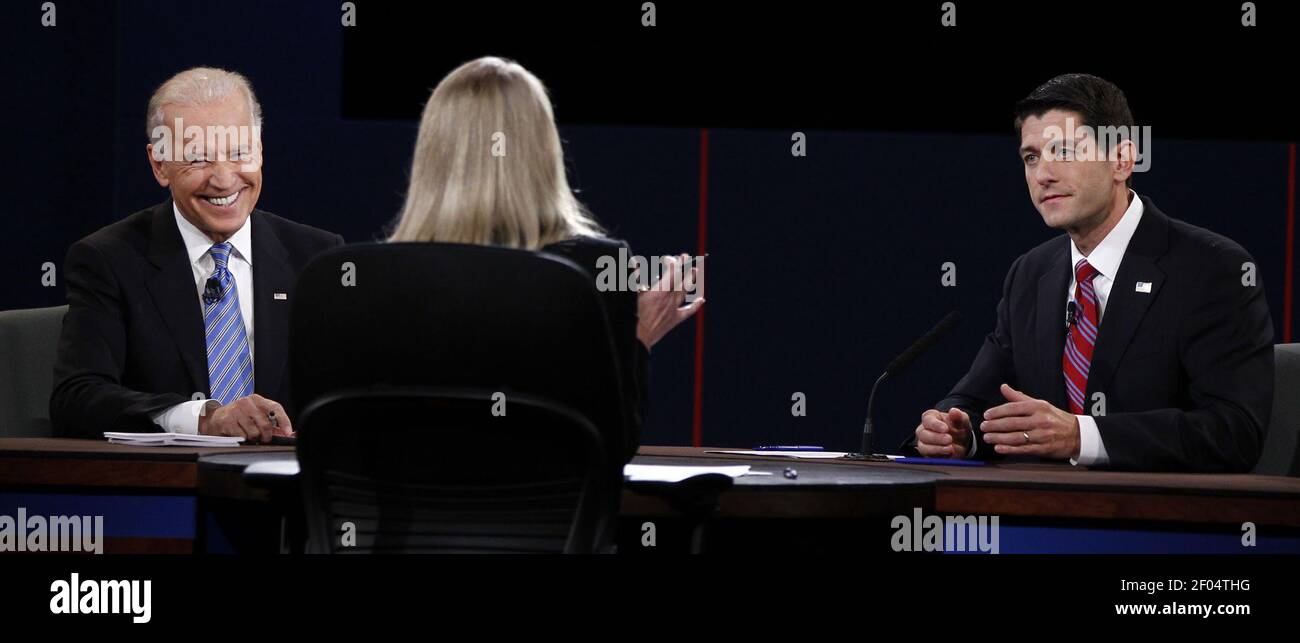 Vice President Joe Biden, left, and Congressman Paul Ryan listen to ...