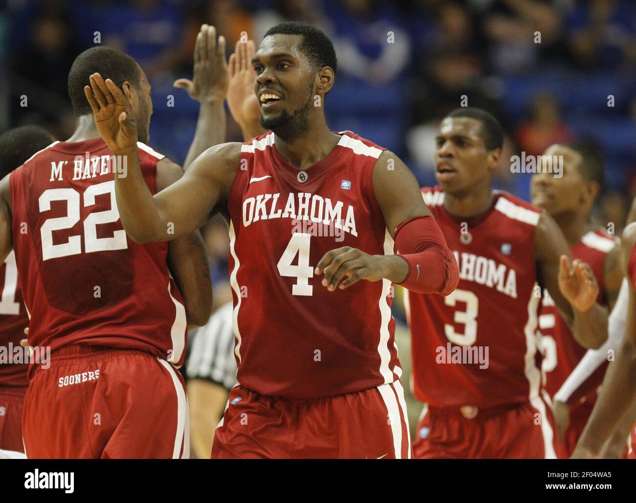 Oklahoma Sooners forward Andrew Fitzgerald (4) teammates high five in ...