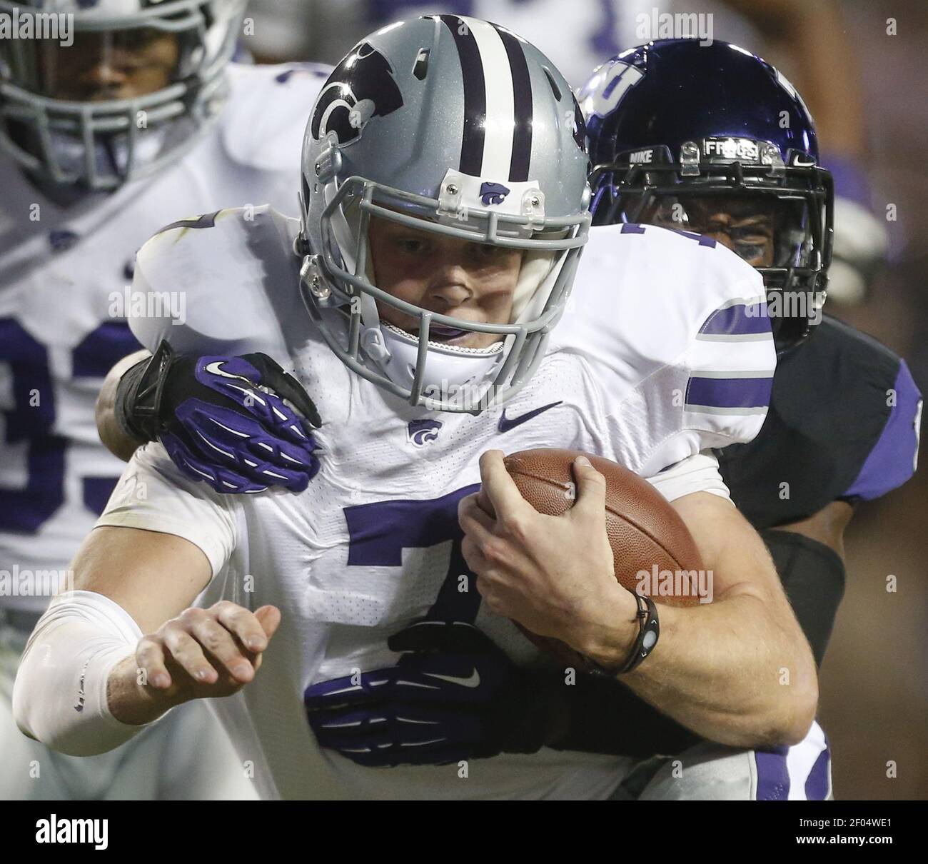 Kansas State quarterback Collin Klein (7) scores on a 7-yard touchdown ...