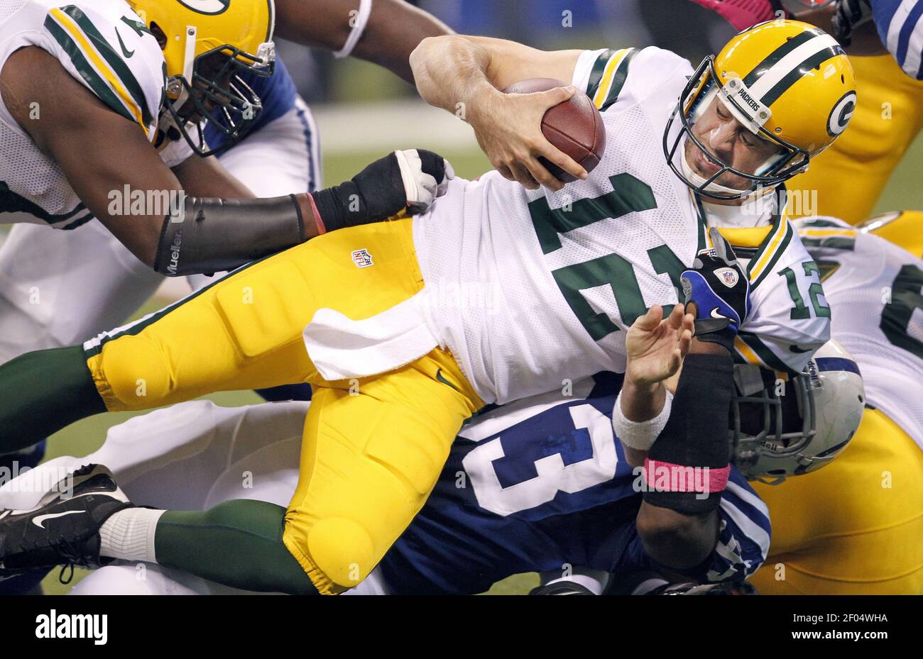 Green Bay Packers quarterback Aaron Rodgers (12) is sacked by ...