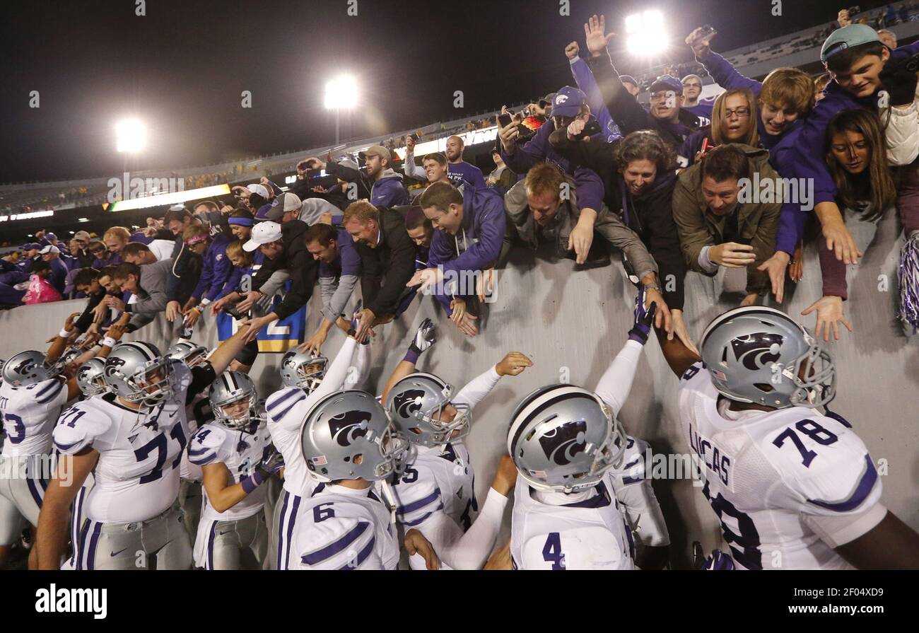 Kansas State fans celebrate with their team after a 55-14 win over West ...