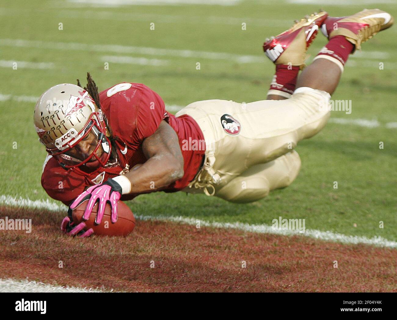 Florida State's Devonta Freeman leaps into the end zone with a 9-yard ...