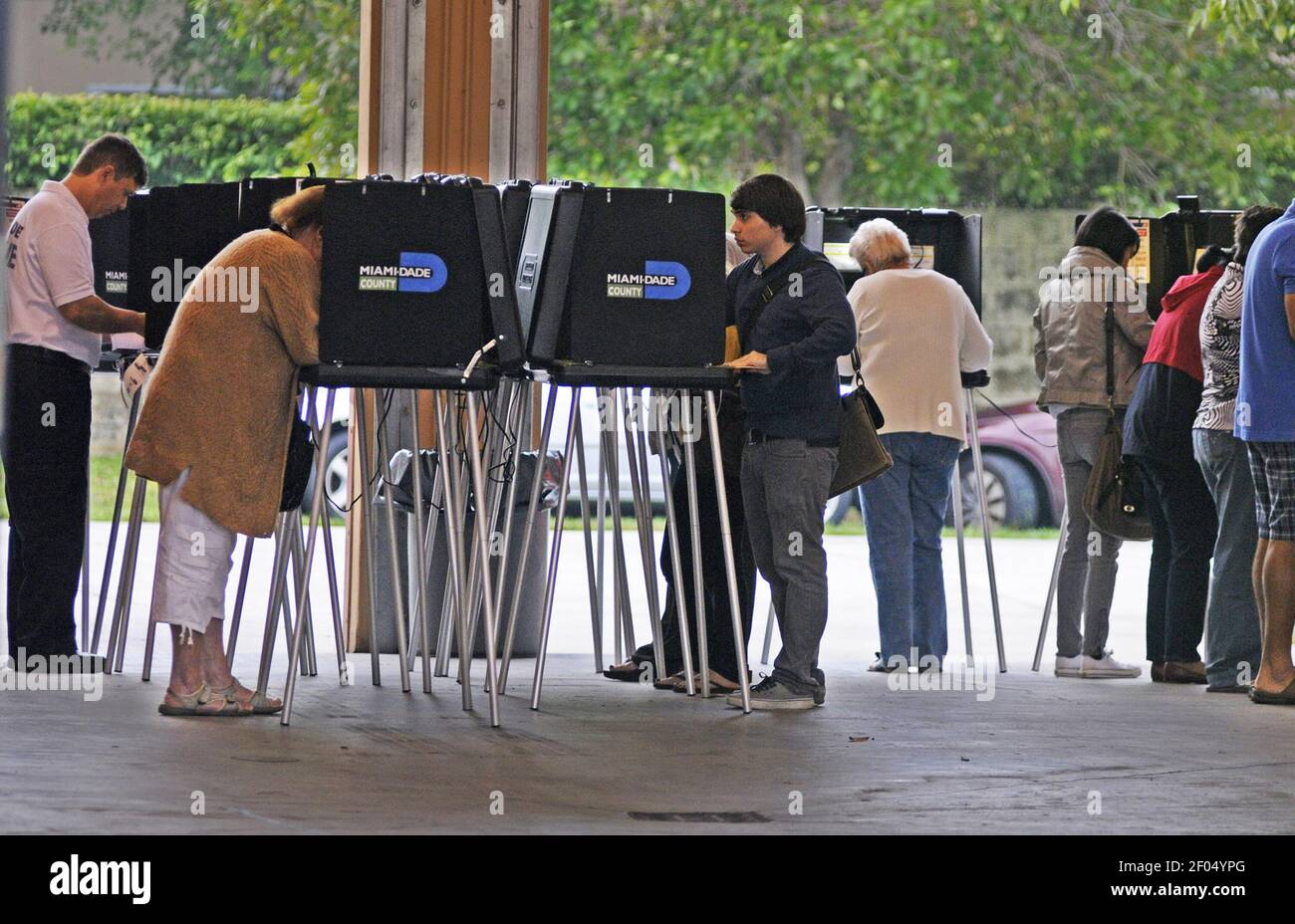 Voters at precinct 797 at fire station No. 56 in Miami-Dade County ...