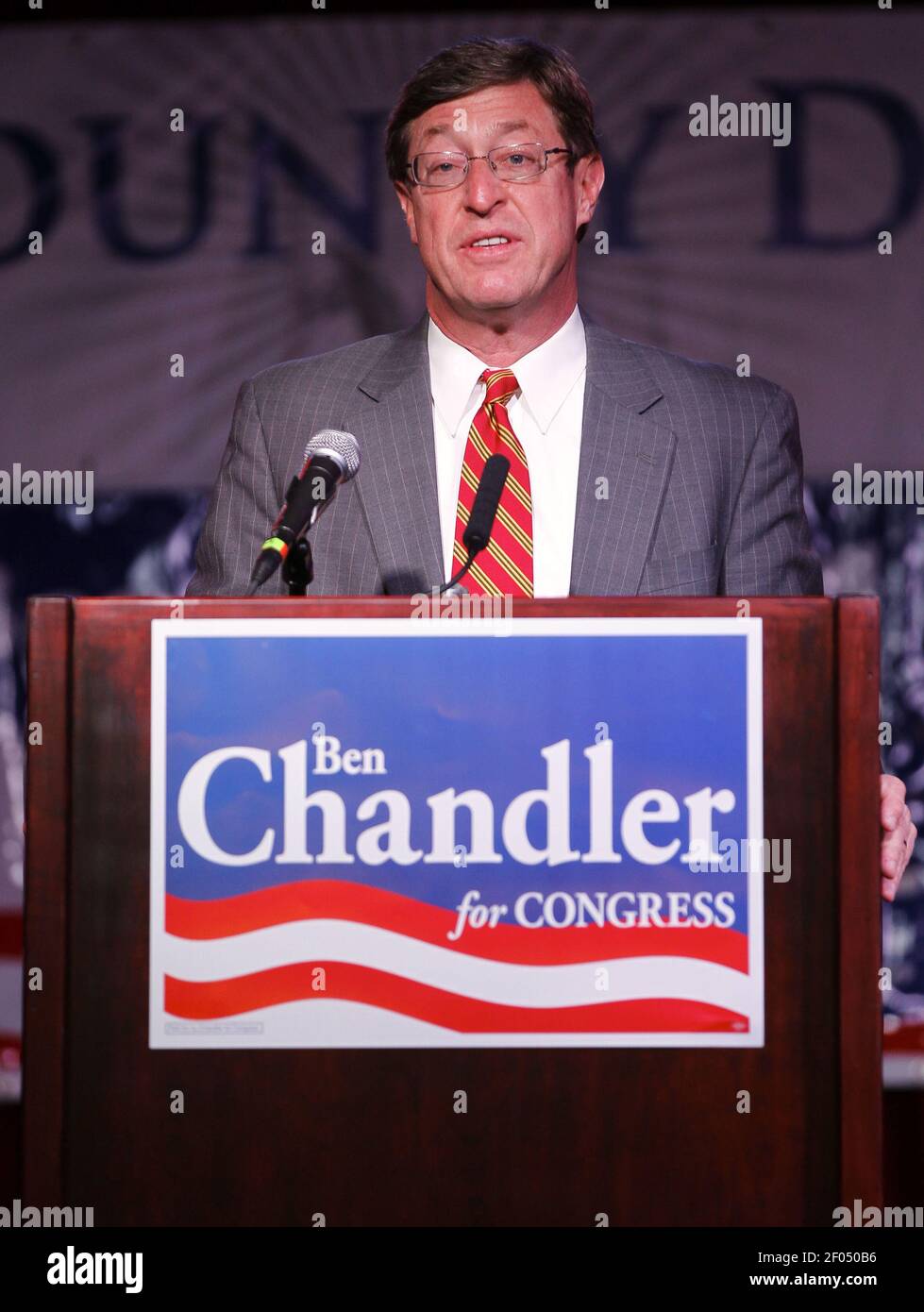 Congressman Ben Chandler, with his wife Jennifer at his side, gives his ...