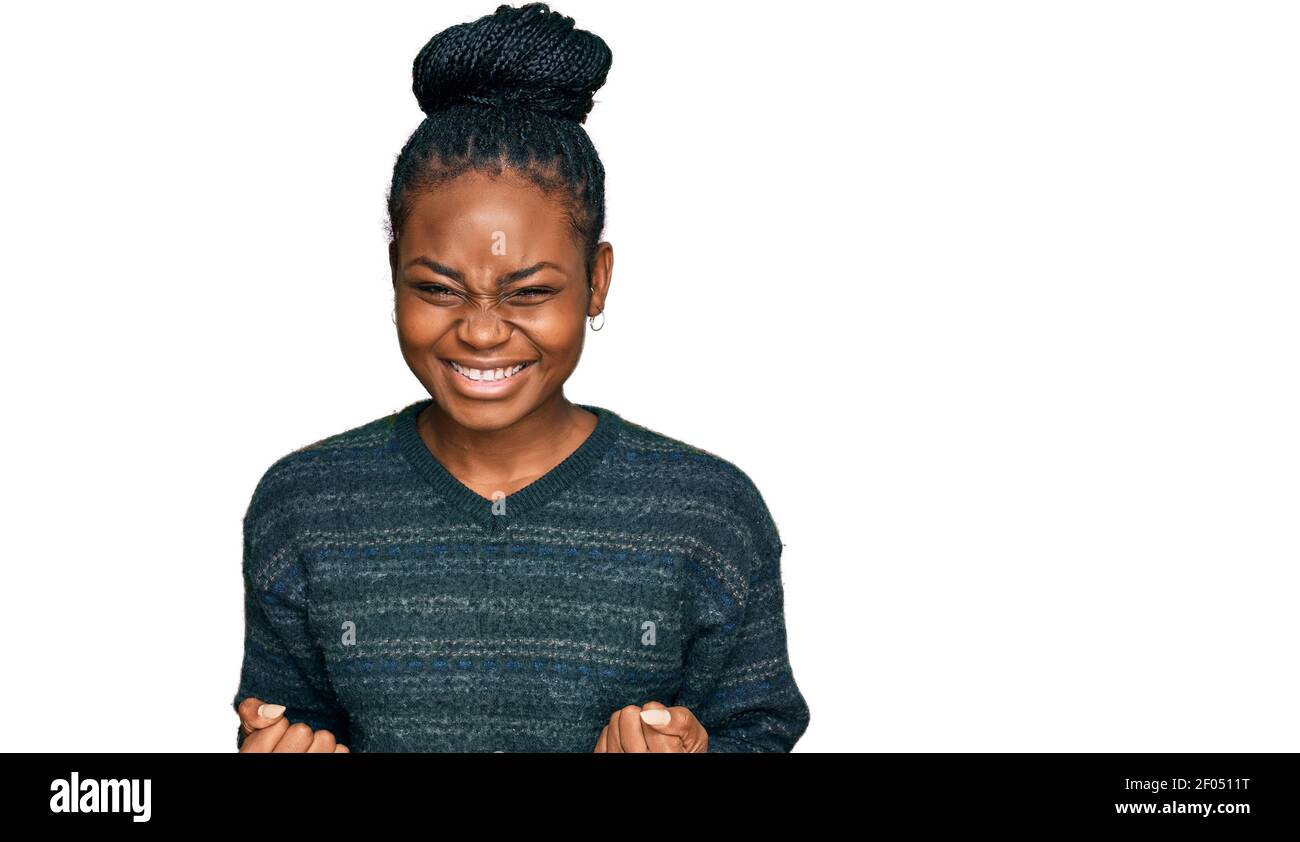 Young african american woman wearing casual clothes very happy and ...