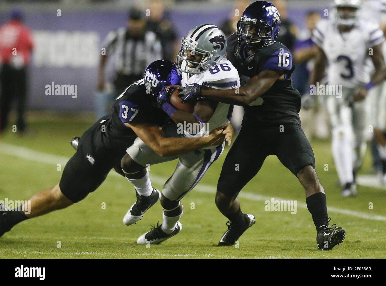 Kansas State's Tramaine Thompson returns a punt while Texas Christian's ...