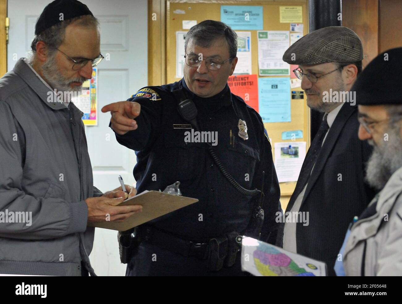 Baltimore County Police Officer Sam Bennett, center, with watch members ...