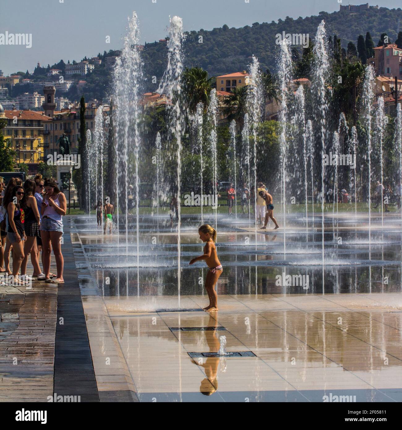 Children playing with a fountain Stock Photo - Alamy