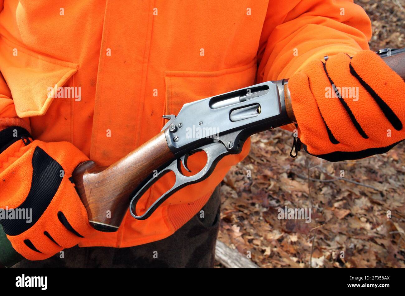 The lever action rifle is used for deer hunting by Bob Willging of ...