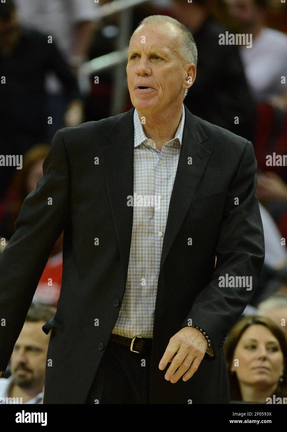 Head coach Doug Collins of the Philadelphia 76ers leads his team ...