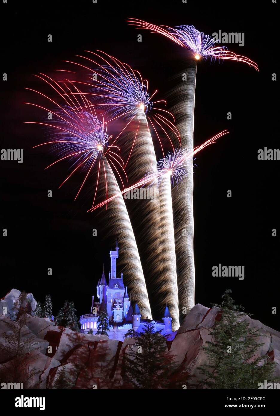 Fireworks blast over the Beast's Castle during a preview party at the ...